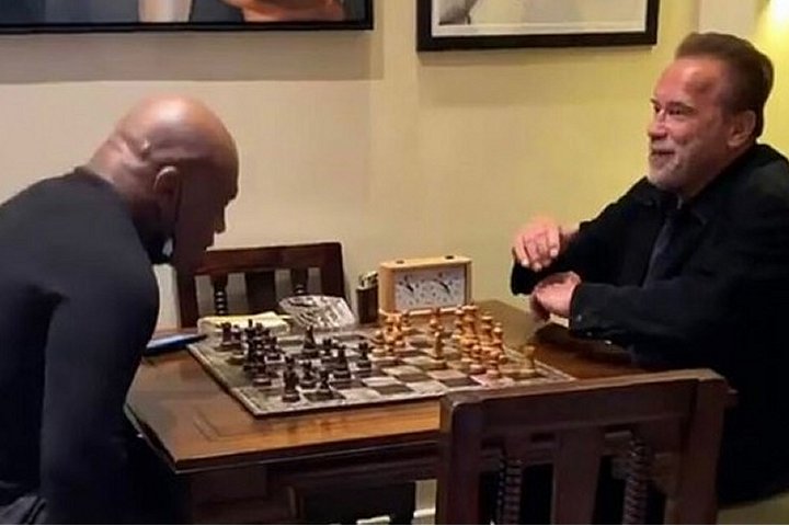 A heavyweight chess match: Arnold Schwarzenegger vs Mike Tyson | ChessBase